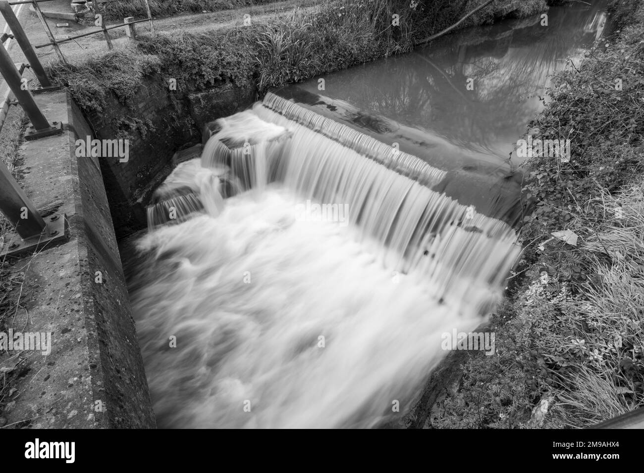 Long exposure of a watefall on the River Lim walkway at Lyme Regis in ...