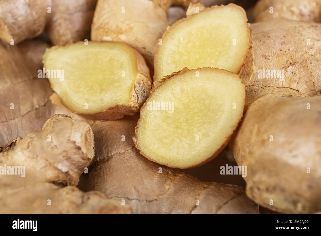 Texture of fresh ginger as background Stock Photo - Alamy