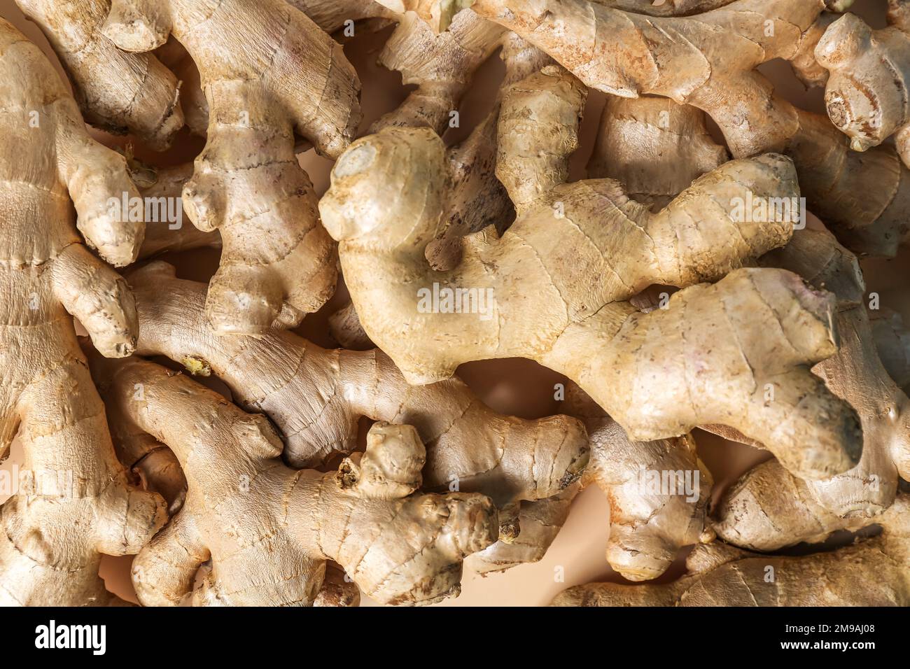 Texture of fresh ginger as background Stock Photo - Alamy