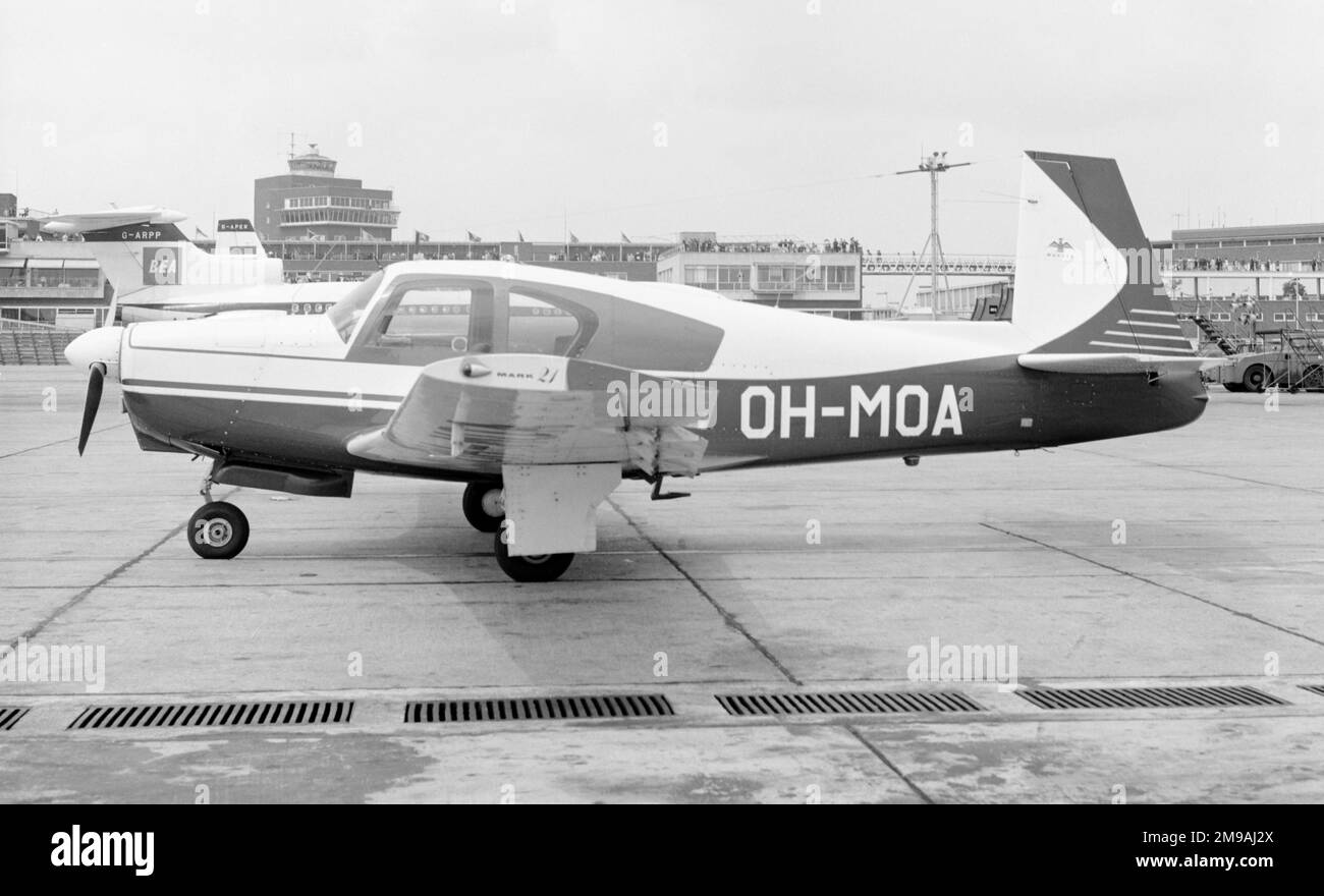 Mooney M.20A Mark 21 OH-MOA, at London Heathrow Airport, parked next to ...