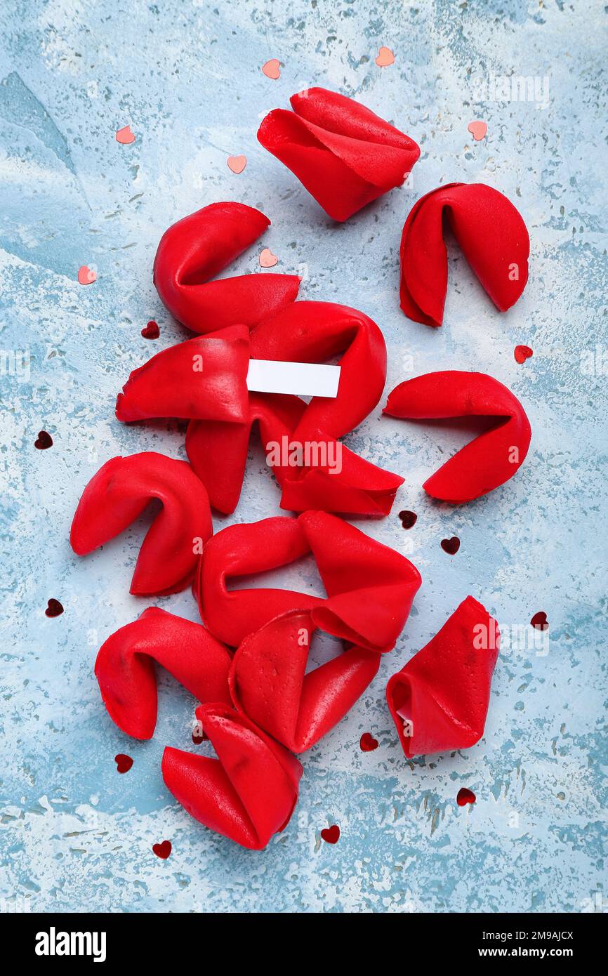 Red fortune cookies with hearts on grunge background. Valentine's Day ...
