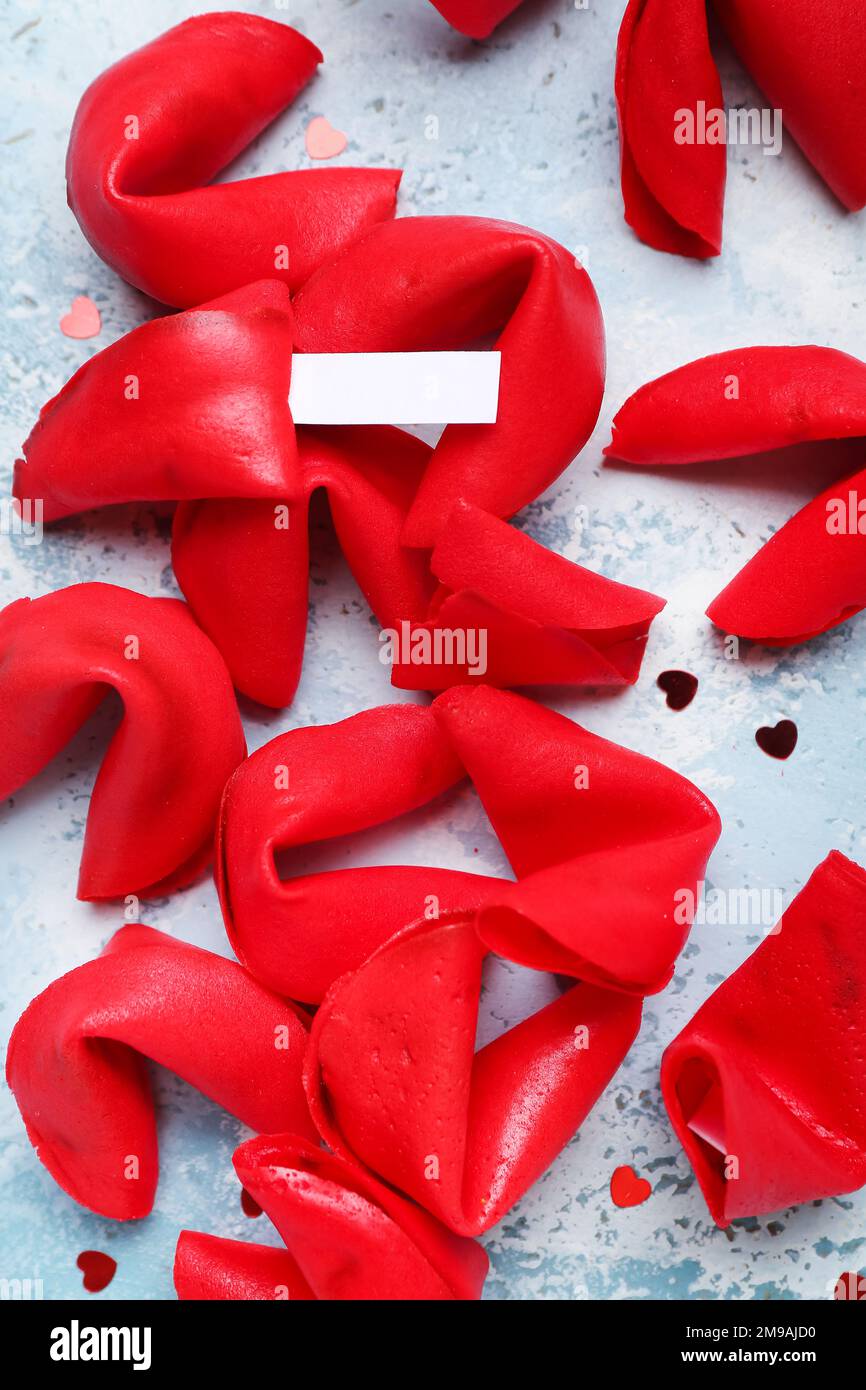 Red fortune cookies with hearts on grunge background, closeup ...