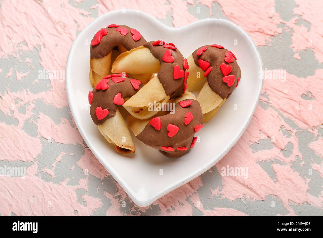 Plate with fortune cookies on grunge background. Valentine's Day ...