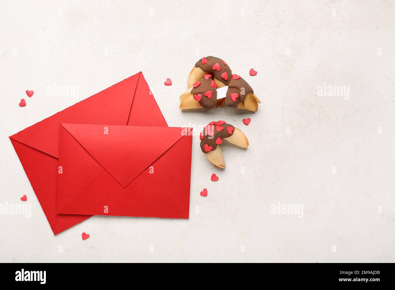 Fortune cookies with envelopes on light background. Valentine's Day ...