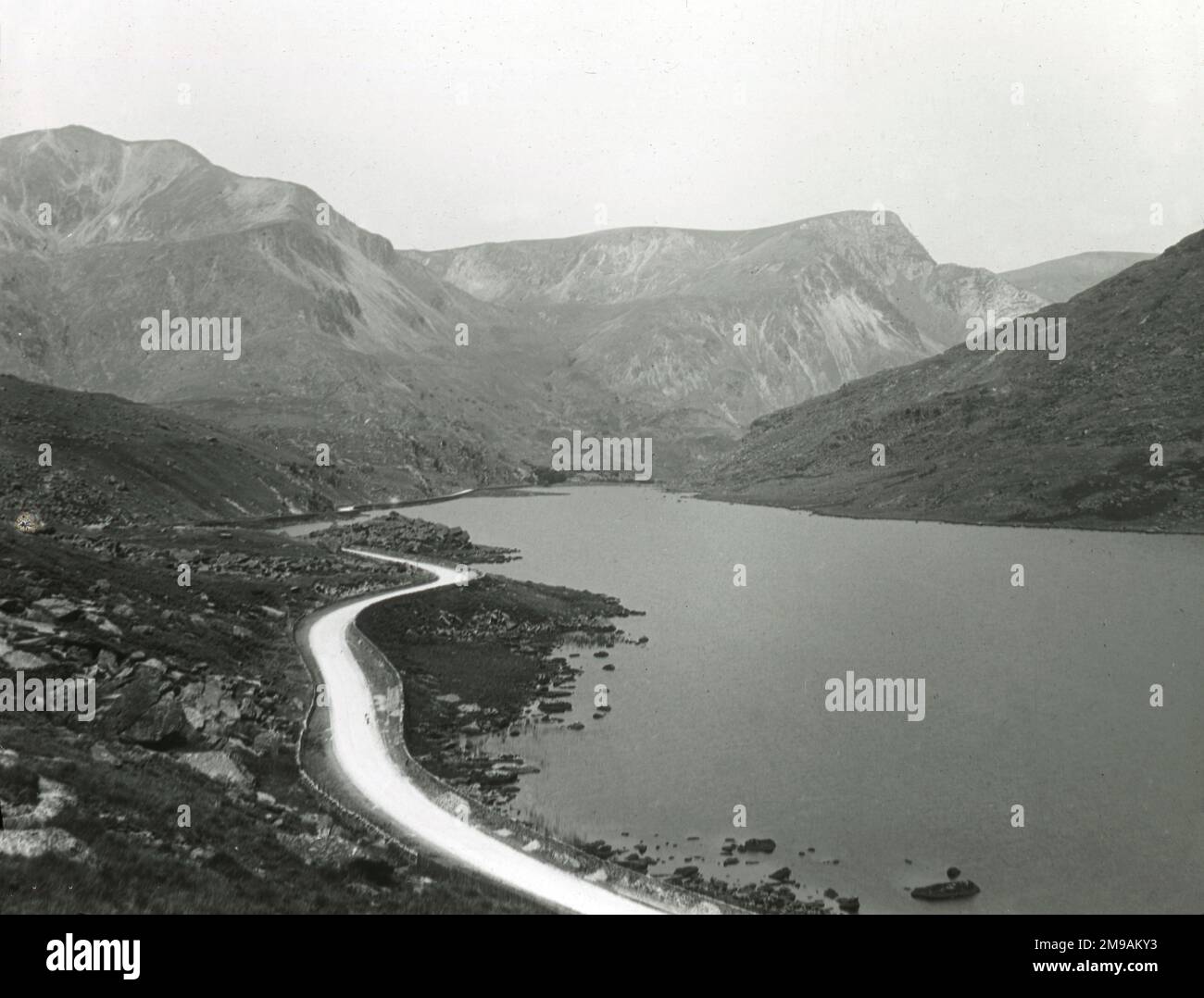 Road by a lake, Snowdonia National Park, North Wales Stock Photo - Alamy