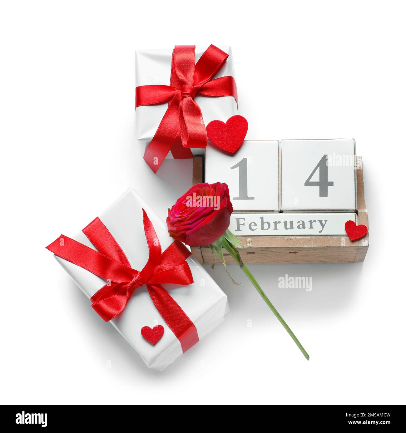 Gift boxes with beautiful bows, rose flower and cube calendar with date ...