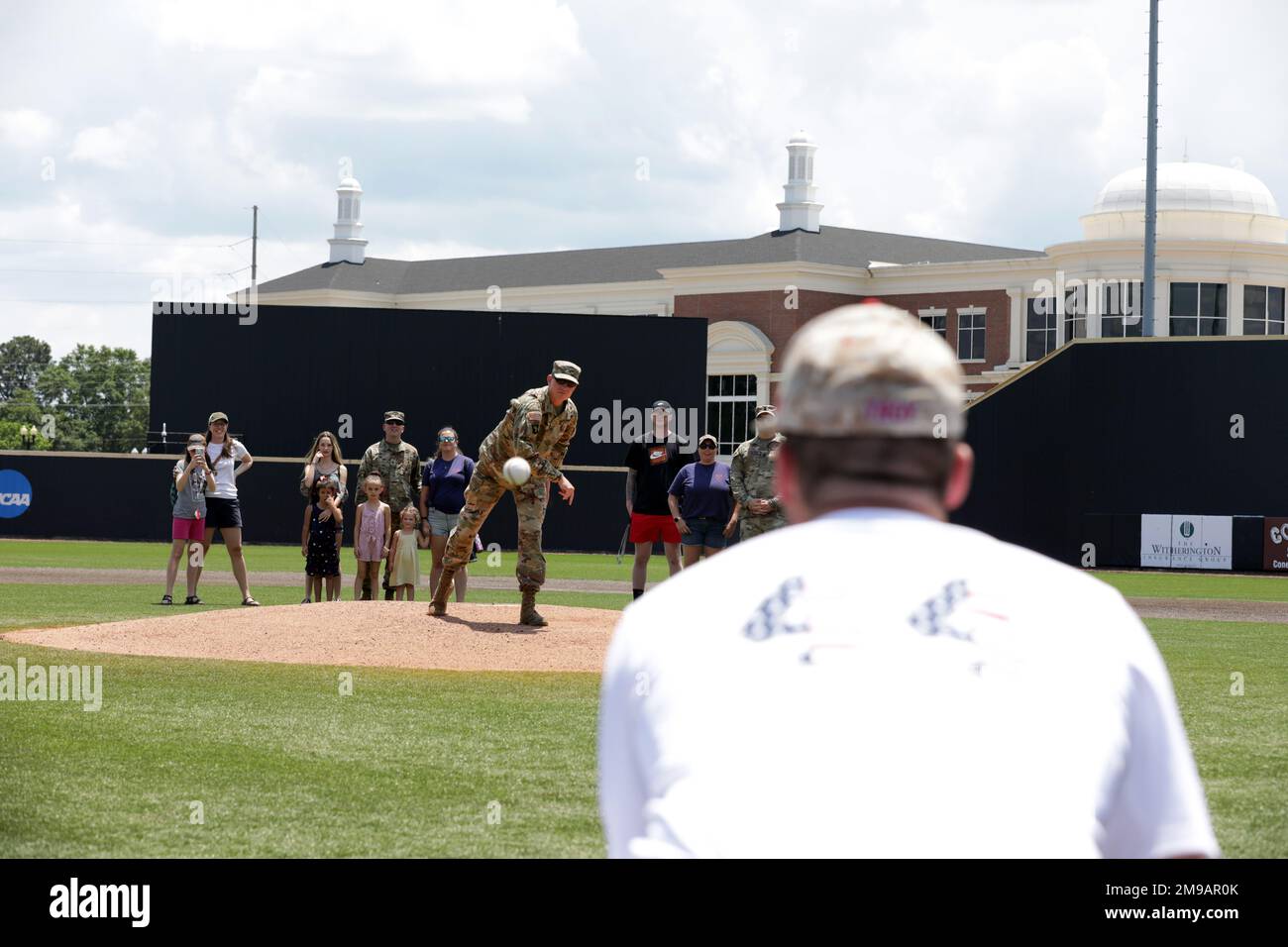 Col. Michael Johnson, 110th Aviation Brigade commander, throws out the ...
