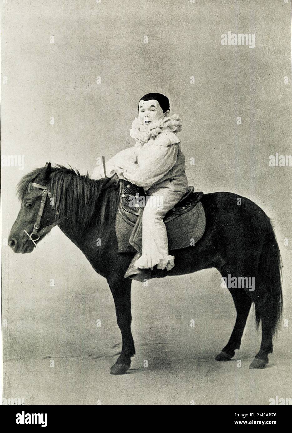 Master Franz Ebert, German actor-comedian on a pony Stock Photo - Alamy