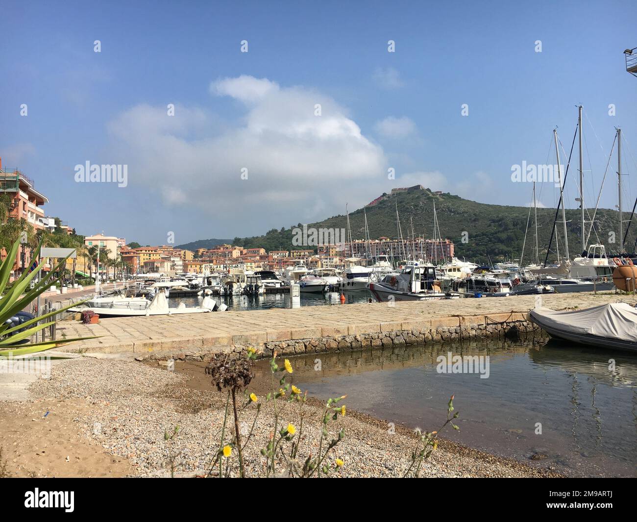 Port Ercole in Tuscany, view over the harbour and the fortress Stock ...