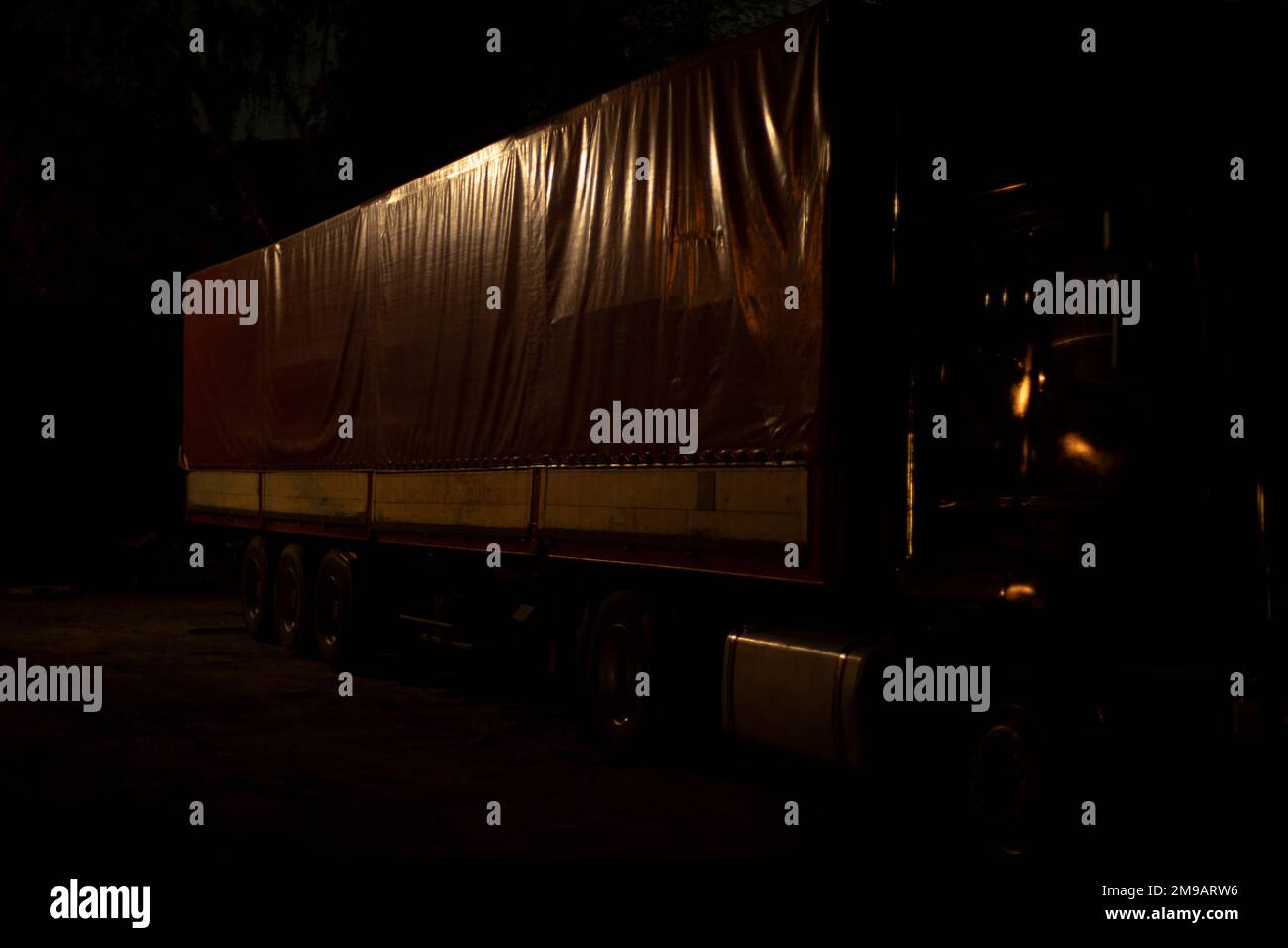 Truck at night. Truck in overnight parking lot. Body of transport ...