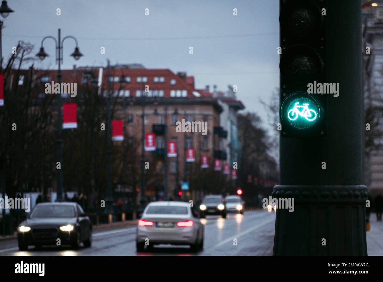 Bicycle traffic light with bicycle icon and active green light. Bike ...