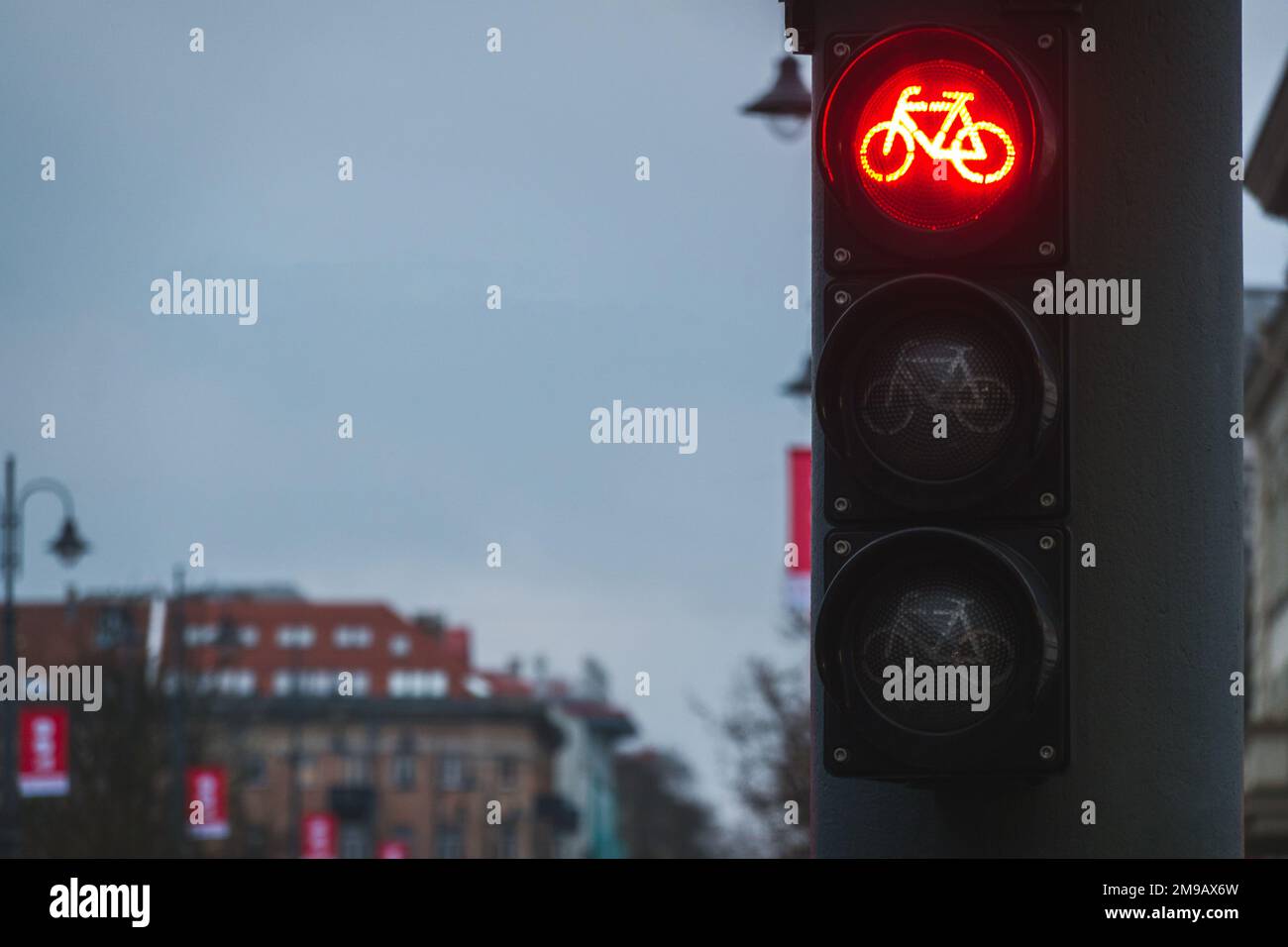 Bicycle traffic light with bicycle icon and active red resolving light ...