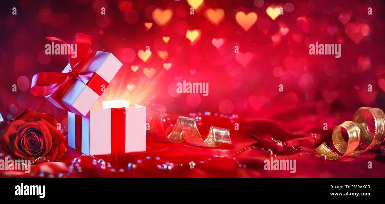 Valentines Day - Present With Magic Hearts Lights - Red Defocused ...