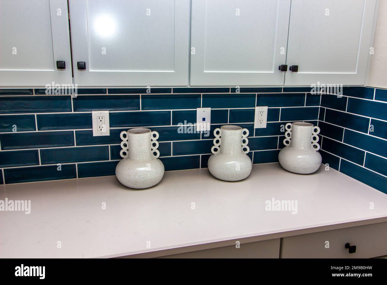 Three Decorative Vases On Kitchen Counter Top Stock Photo - Alamy