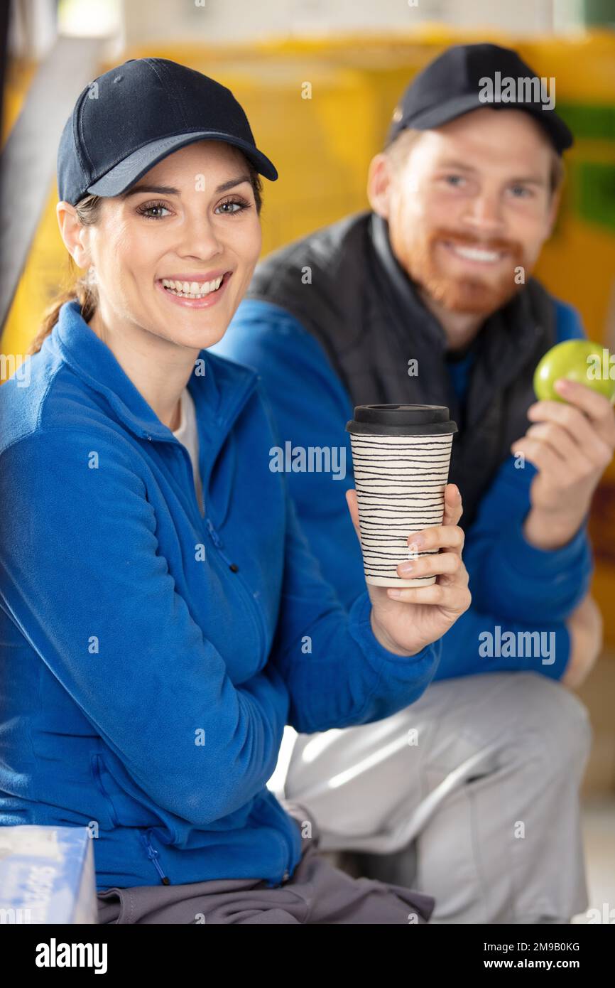 building workers having coffee break Stock Photo - Alamy