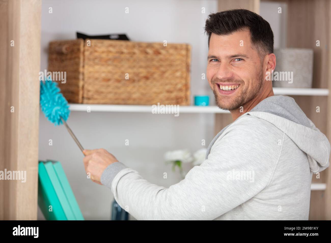 Man feather duster hi-res stock photography and images - Alamy