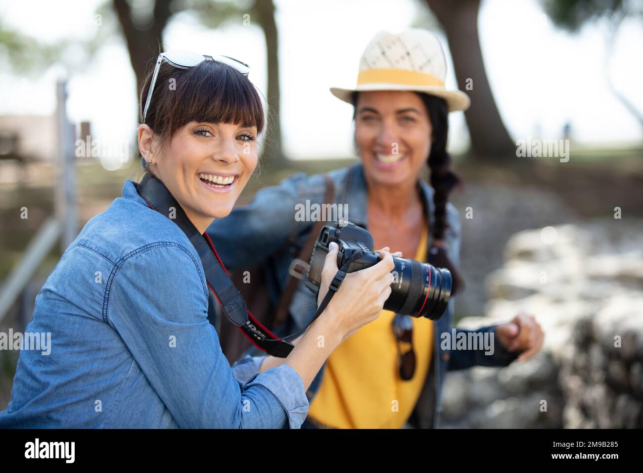 Two beautiful girl taking picture hi-res stock photography and images ...
