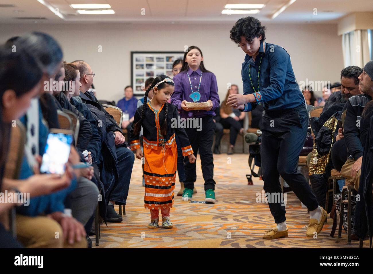 Dancers lead youth carrying the medals for the 2023 North American ...