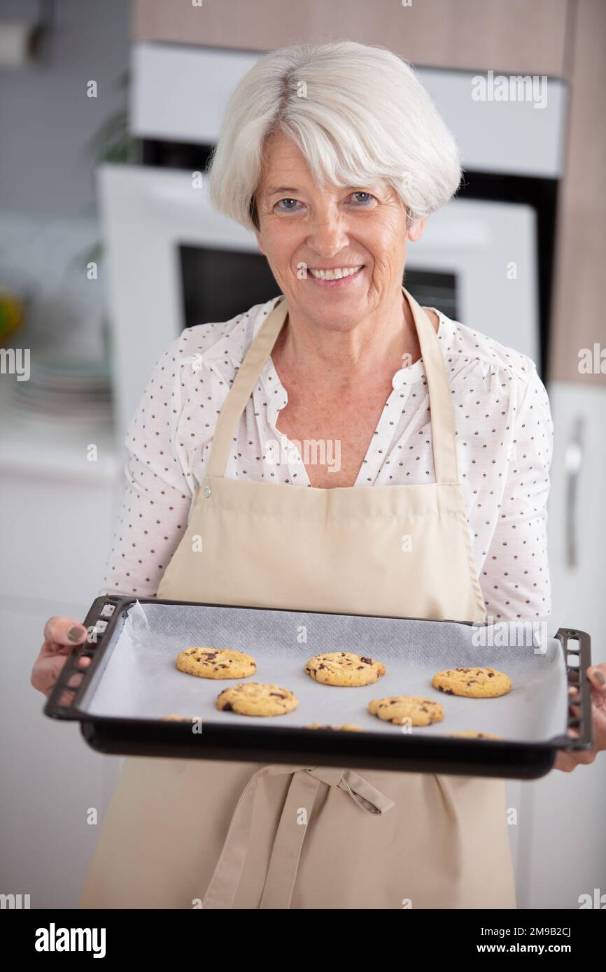 Old lady baking hi-res stock photography and images - Alamy