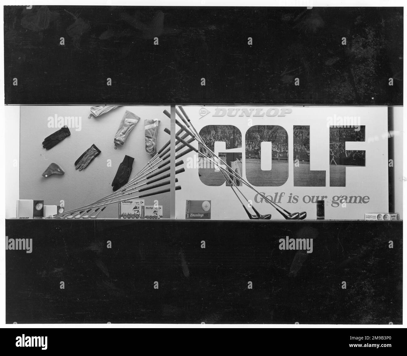 Dunlop shop window showcase, for Golf equipment Stock Photo - Alamy