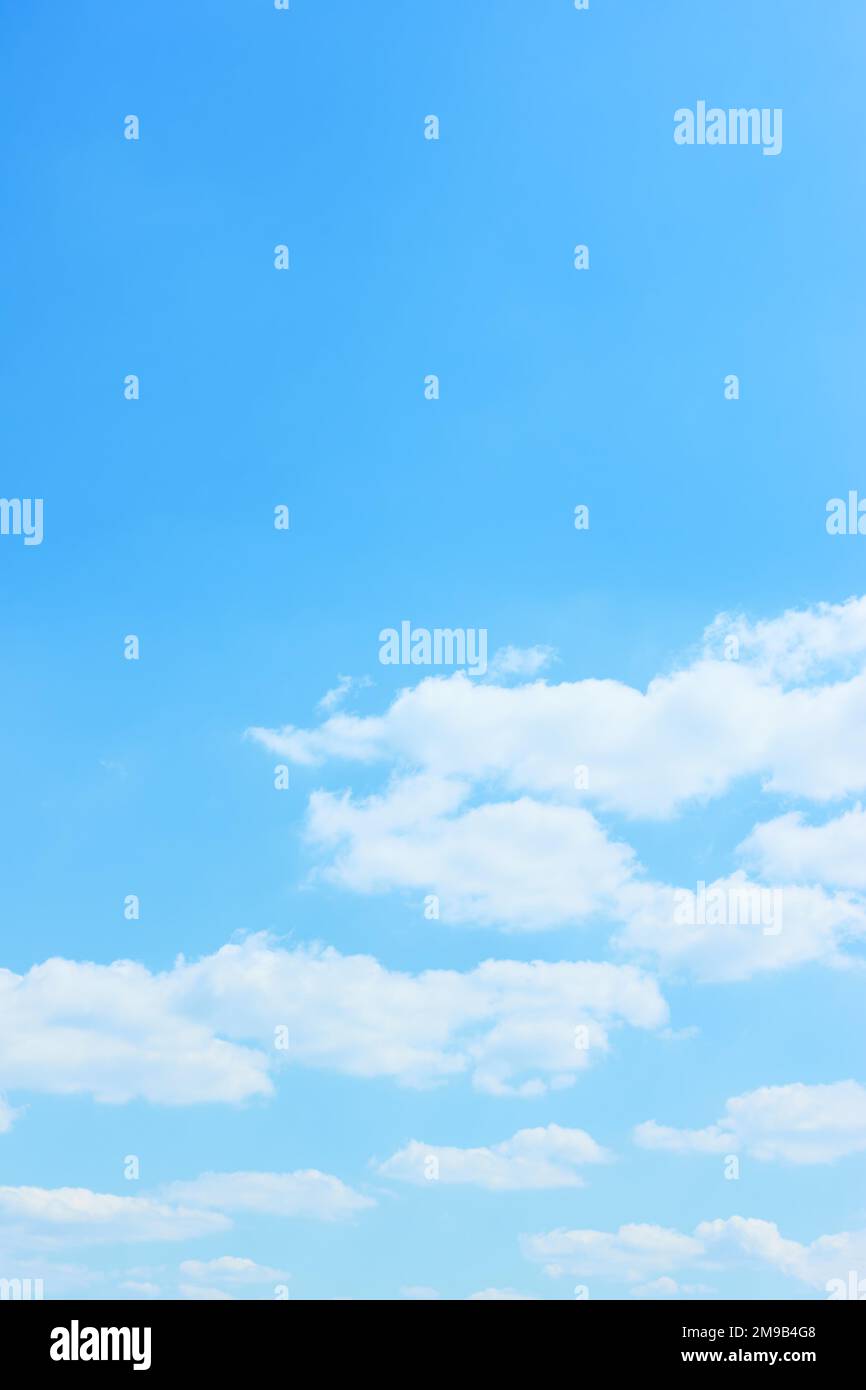 White clouds in the blue sky - vertical background, cloudscape Stock ...