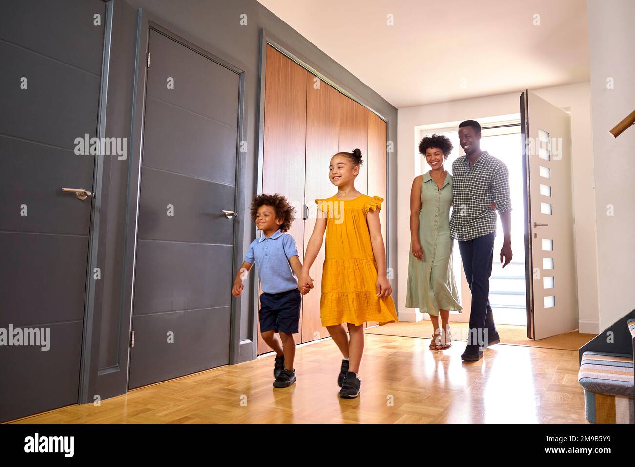 Mother daughter walking hallway hi-res stock photography and images - Alamy
