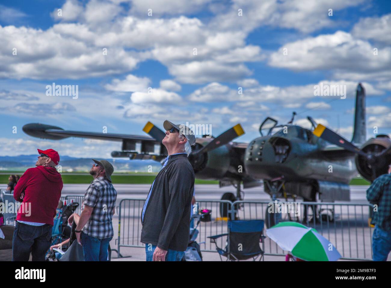 Visitors watch aerial demonstration acts during the 2022 Ellsworth Air ...
