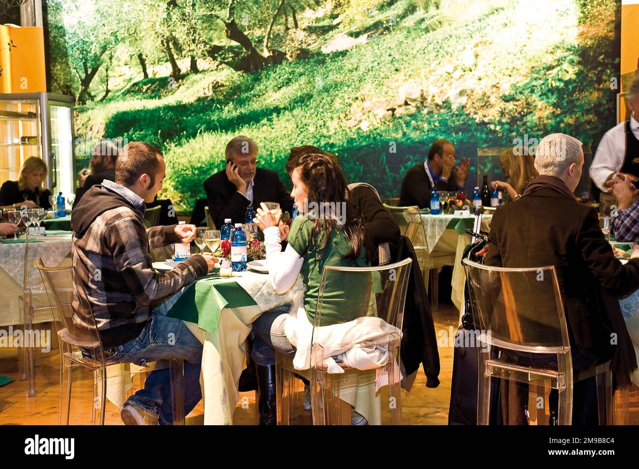 Italy Piedmont Turin - People at tables. They eat italian food Stock ...
