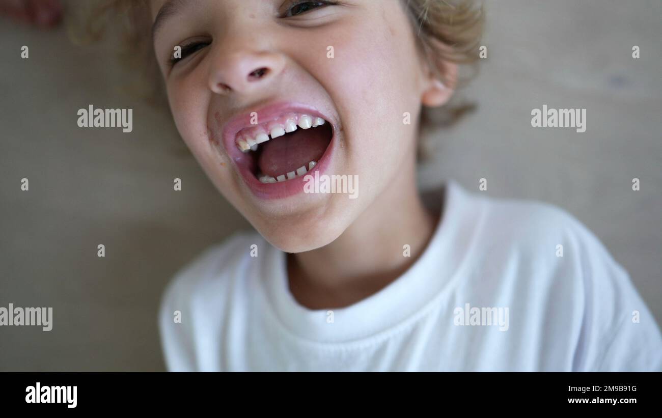 Tickling child boy laughing and smiling, real life authentic laugh ...