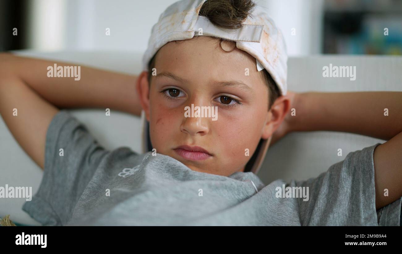 Young boy watching movie, close-up kid face staring at entertainment3 ...