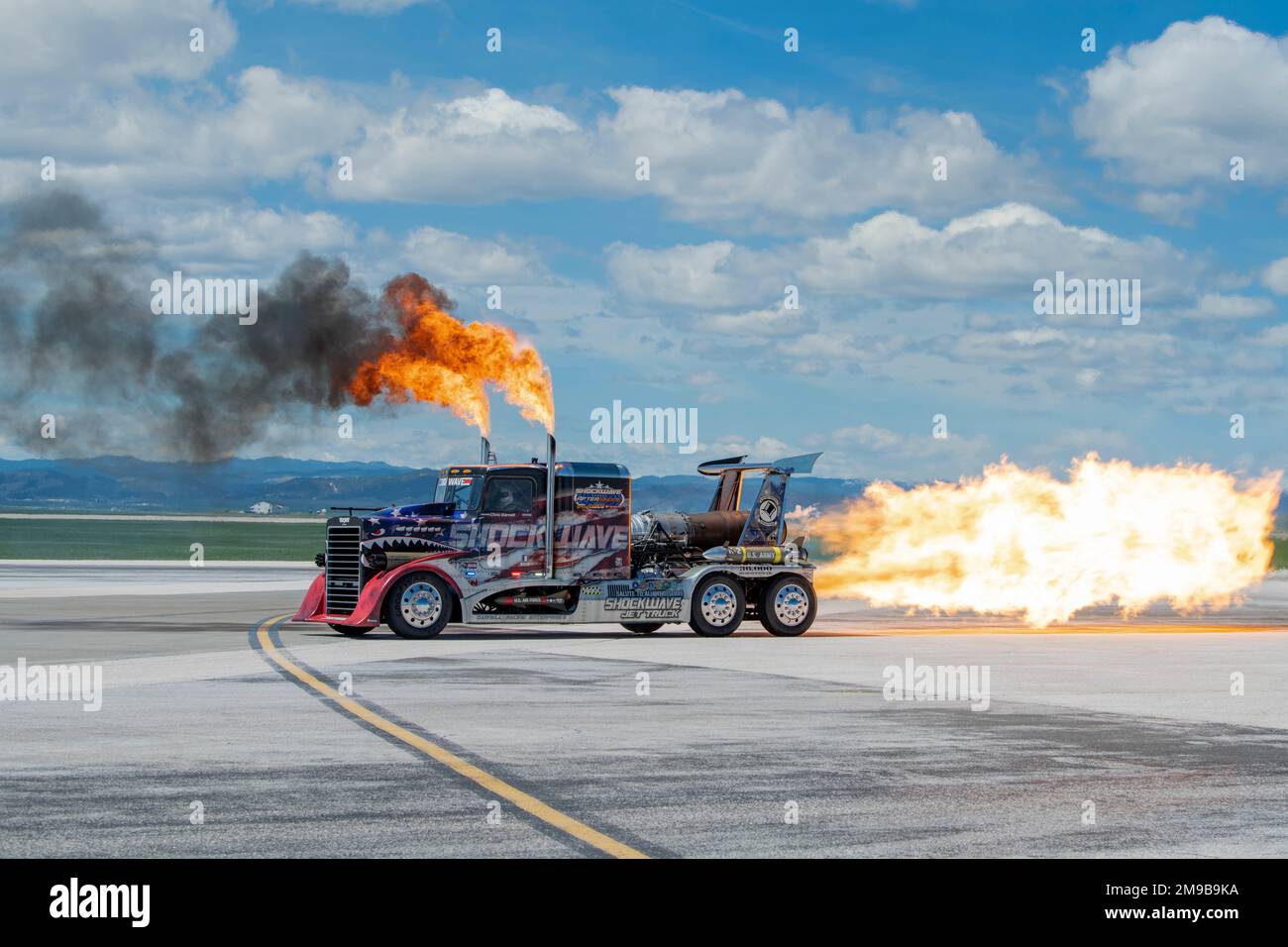 The Shockwave Jet Truck drives on the flight line during the 2022 ...