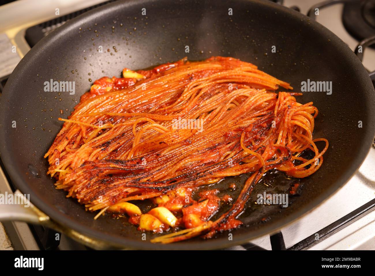 Spaghetti all'Assassina, Italian Puglia traditional pasta Stock Photo ...