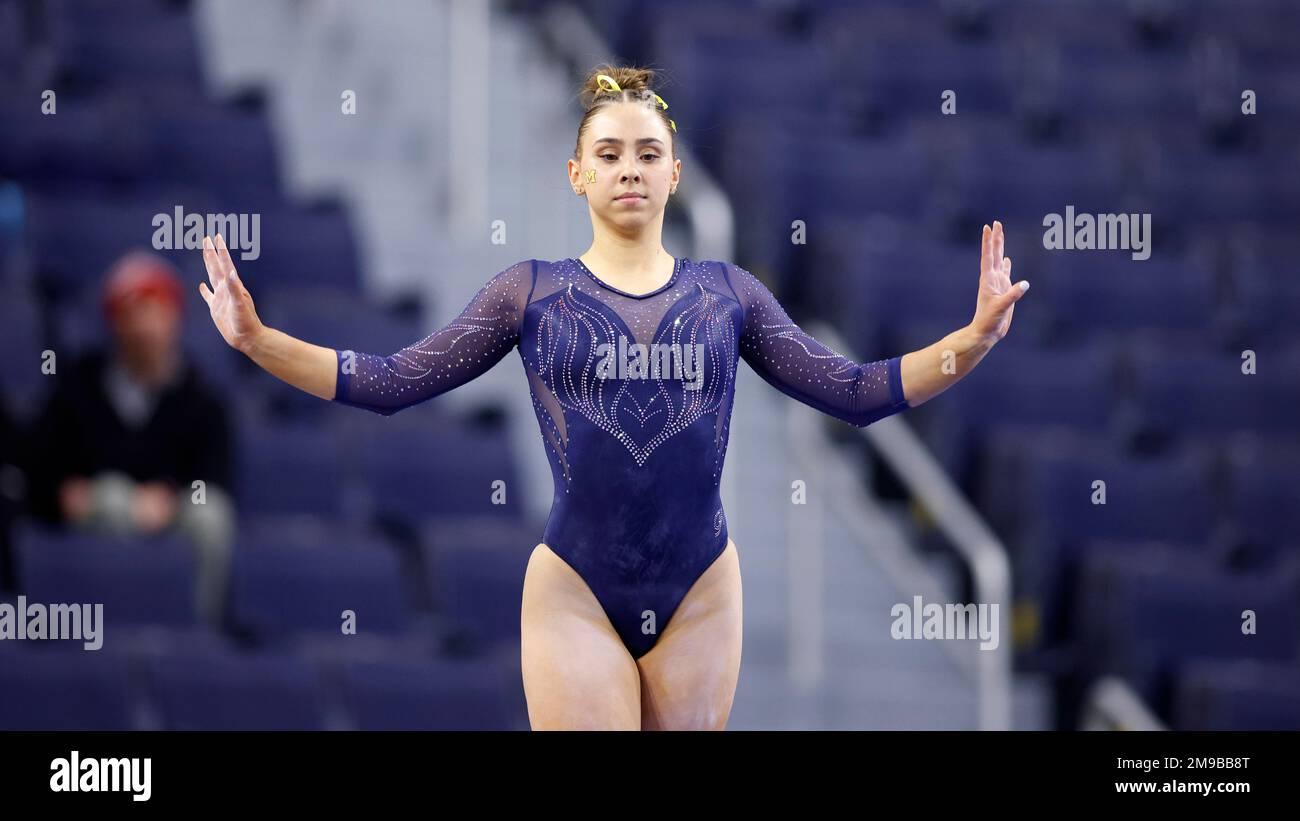 Michigan's Natalie Wojcik competes in the beam during an NCAA ...