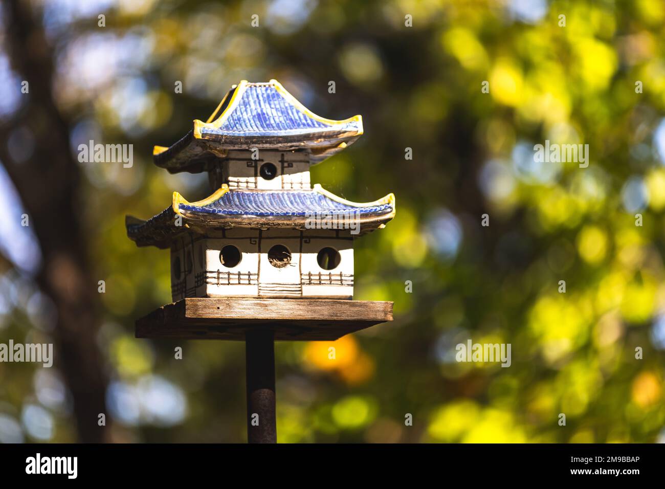 A close-up shot of a mini Japanese-style temple birdhouse at the Fort ...