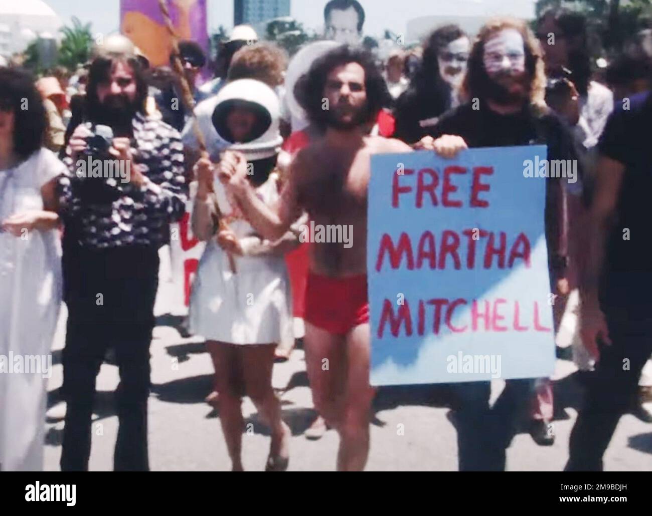 THE MARTHA MITCHELL EFFECT, protest rally with sign reading 'Free ...