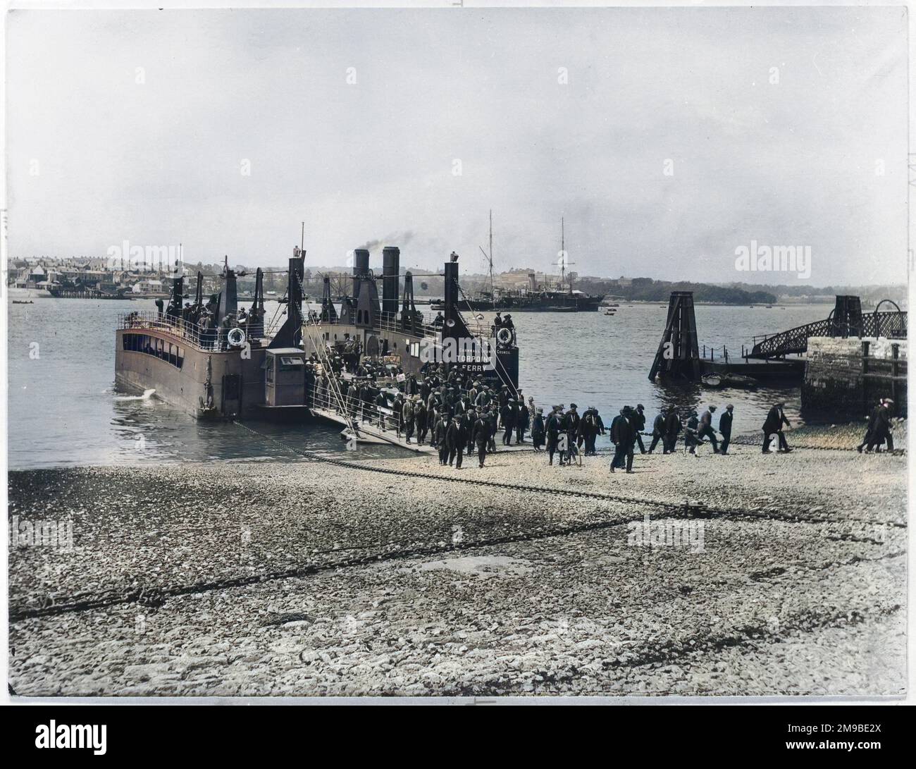 Passengers disembark from the Torpoint Ferry in Plymouth Harbour, Devon ...