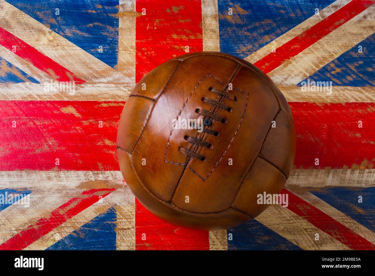 Vintage Soccer Ball On Folk Art British Flag Stock Photo - Alamy