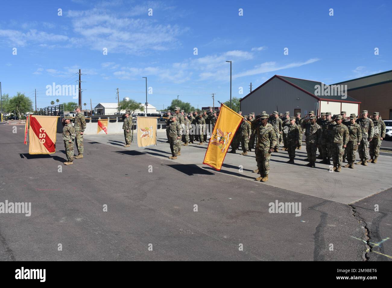 Soldiers from the 653rd Regional Support Group salute during the ...