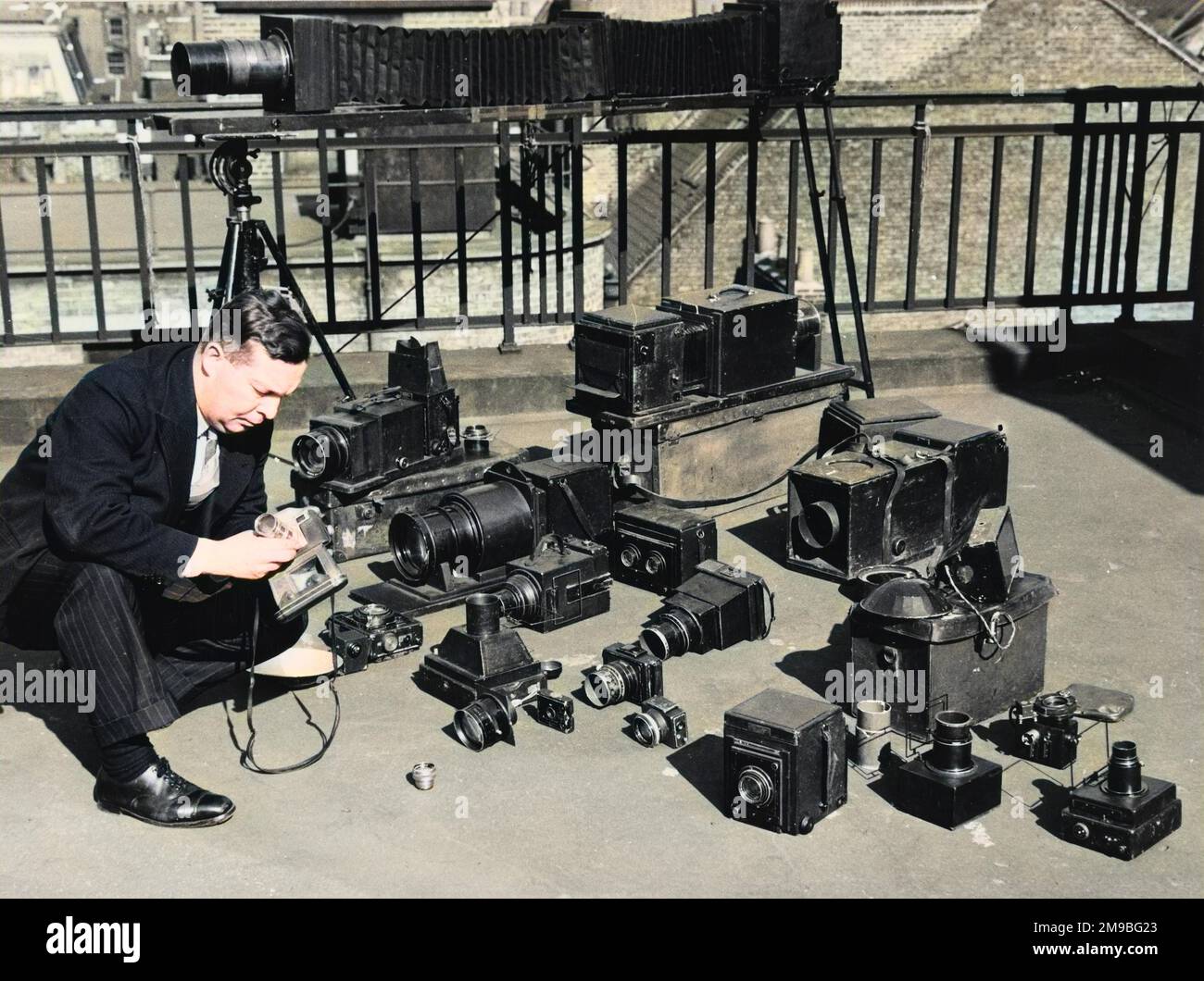 The Daily Mail photographer Frank Rust with an array of photographic ...
