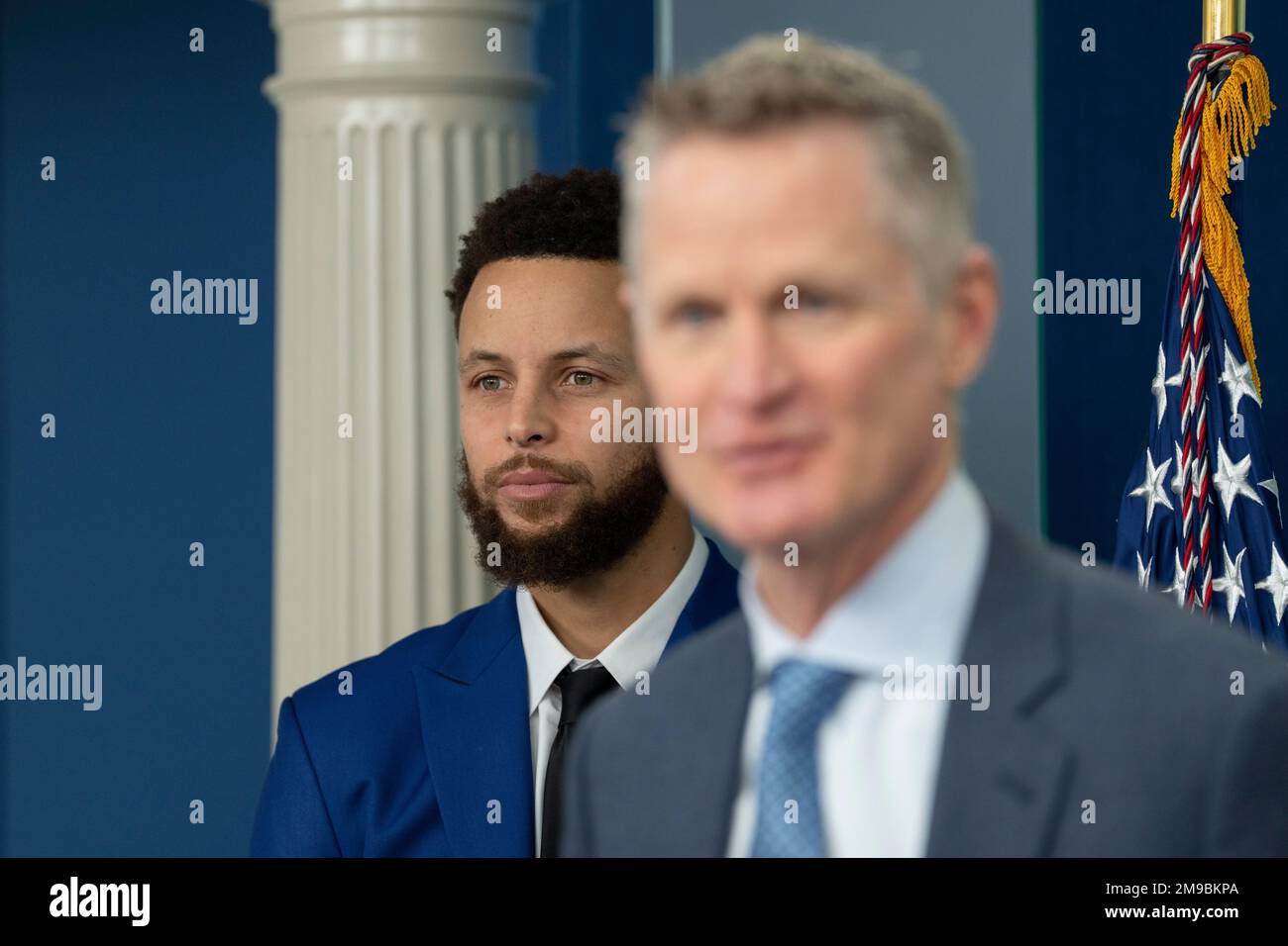 Golden State Warriors point guard Stephen Curry, looks on as head coach ...