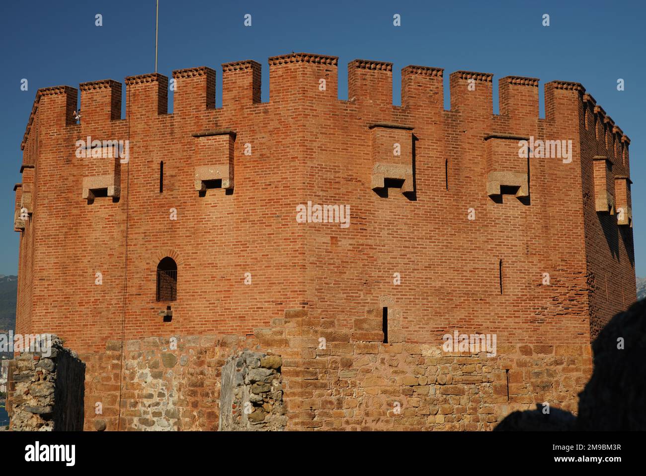Red Tower in Alanya Town, Antalya City, Turkiye Stock Photo - Alamy