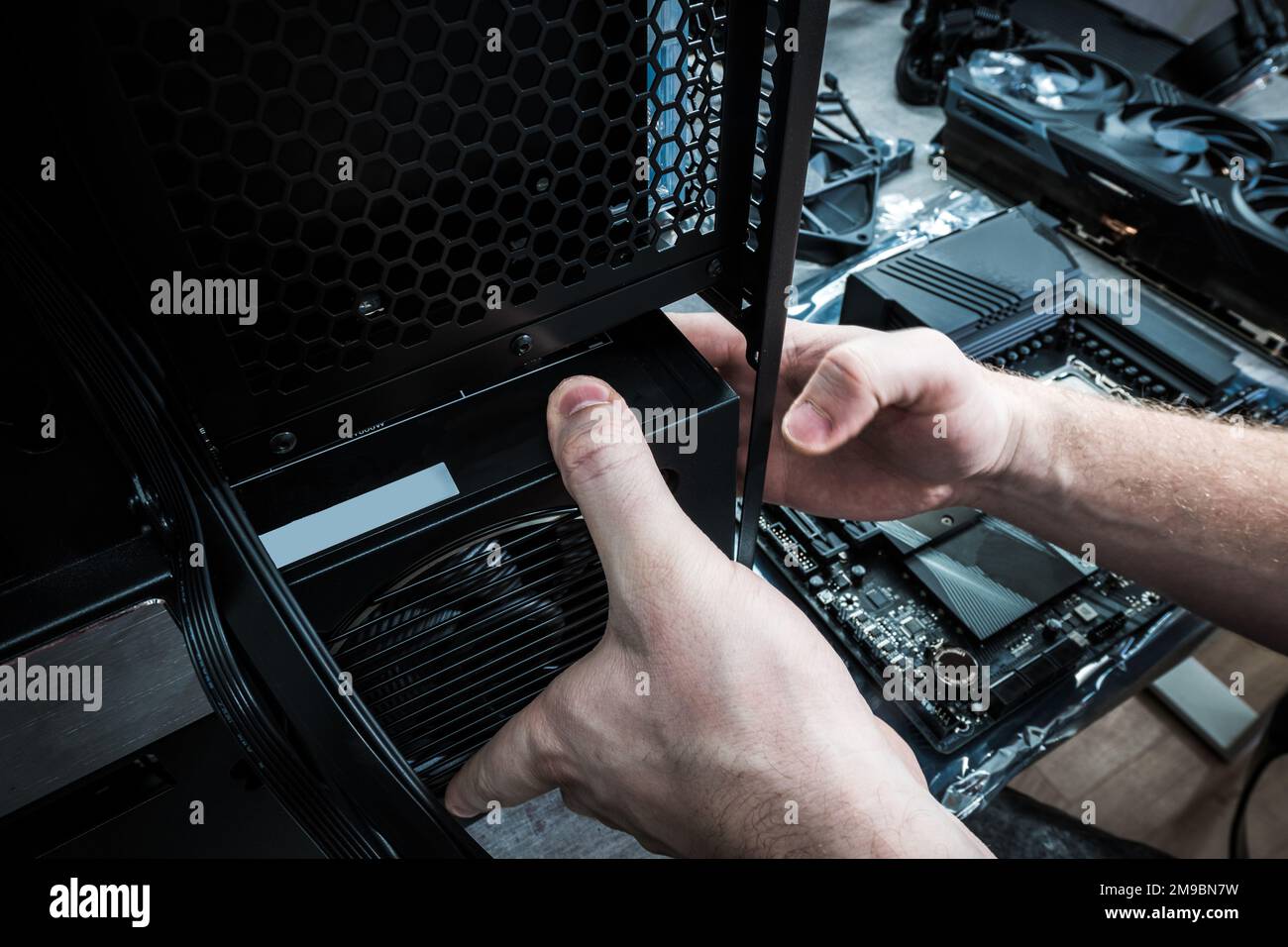 Powerful Modern Desktop Computer Workstation Building by Caucasian ...