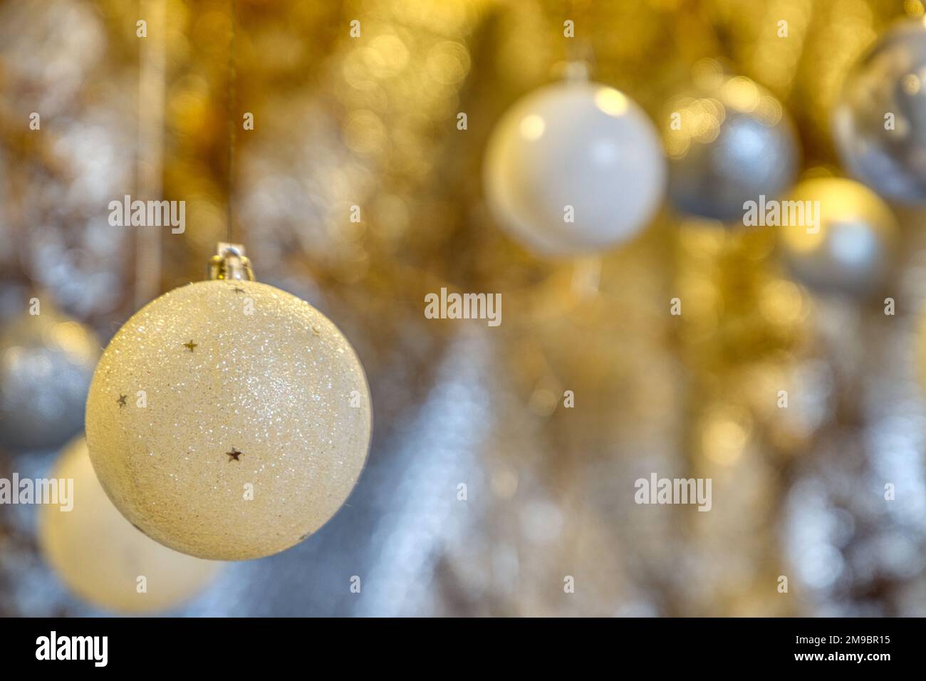 Christmas decorations/baubles dangling in the fireplace Stock Photo - Alamy
