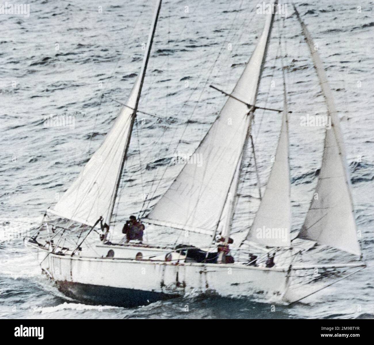 Sir Robin Knox-Johnston and his 32-foot ketch Suhaili, after completing ...