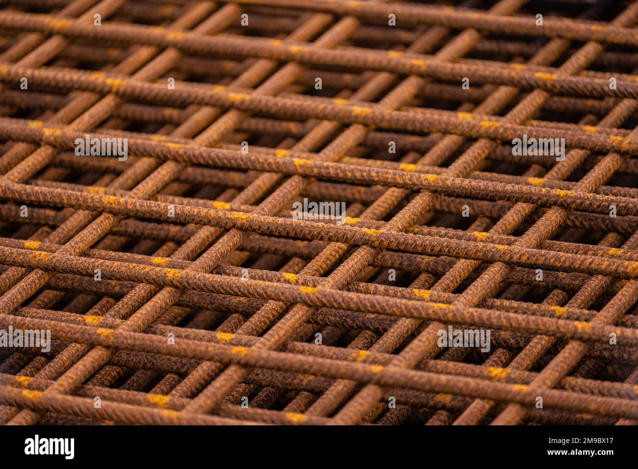 Piles of rusty rebar ready to be used at a construction site Stock ...