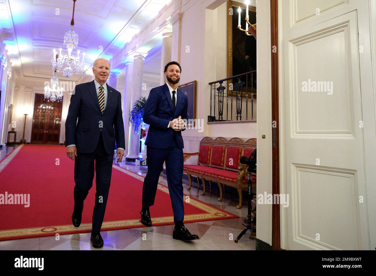 U.S. President Joe Biden arrives with player Stephen Curry to welcome ...