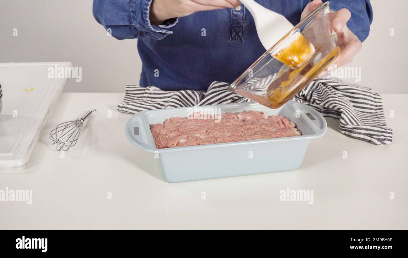 Step by step. Mixing ingredients for a classic beef meatloaf recipe in ...