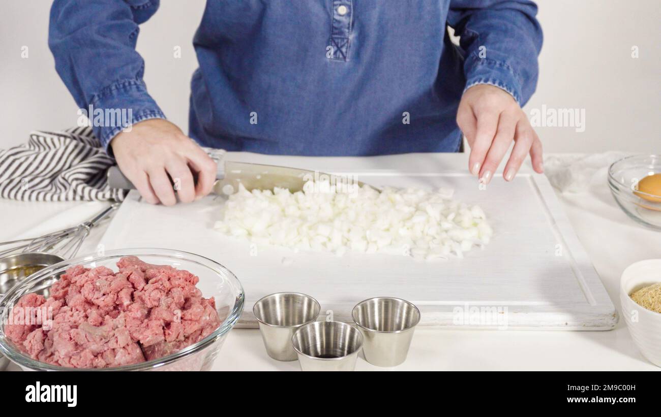 Step by step. Mixing ingredients for a classic beef meatloaf recipe in ...