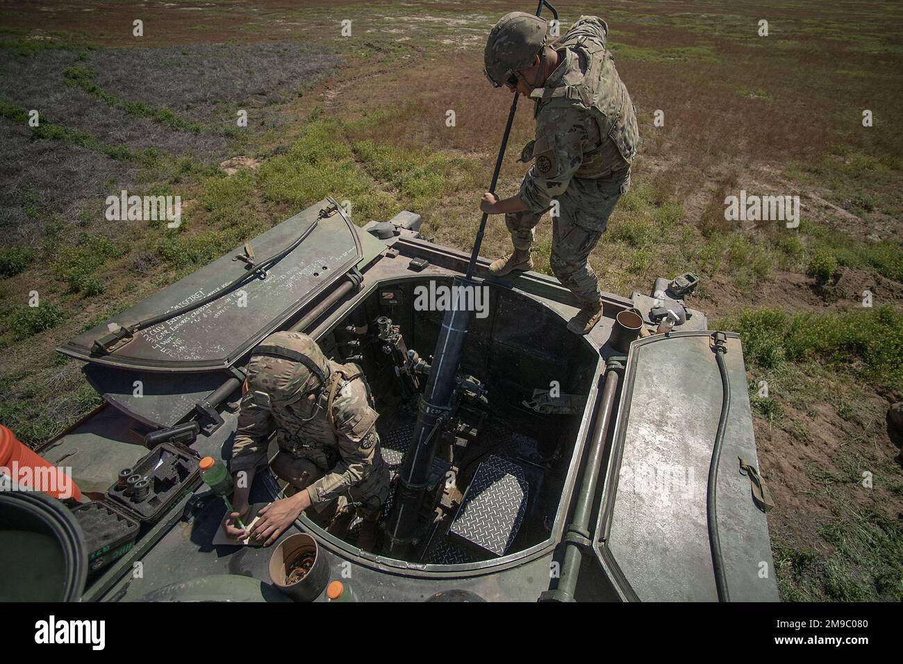 Idaho Army National Guard Soldiers Spc. Carson Hemsley, gunner (bottom ...