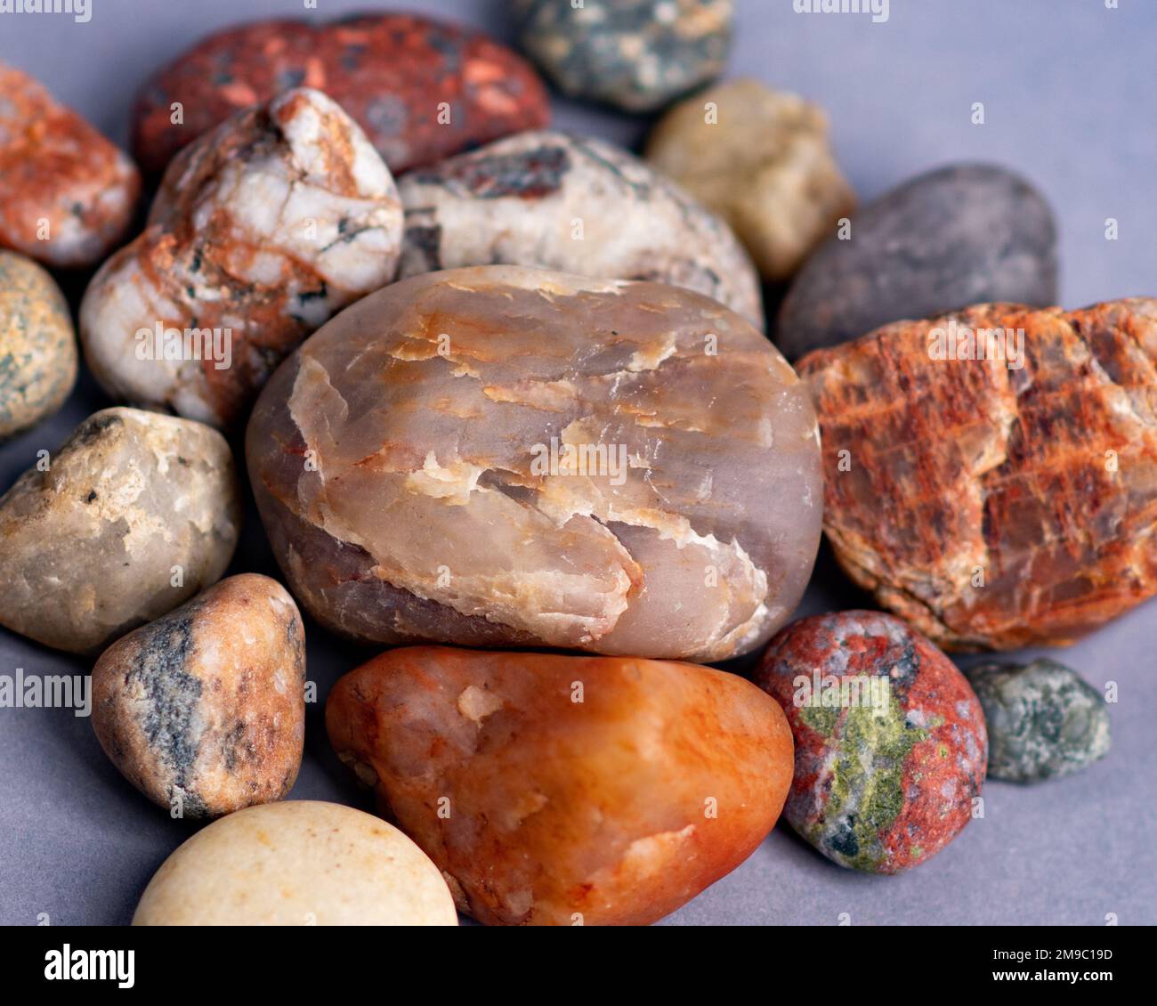 The natural stones in brown white and gray colors, placed by each other ...